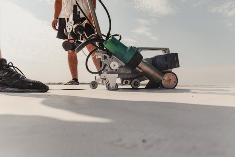 Easier Installation of Roofing Pucks with Two-Stage TPO Adhesive - Unichem